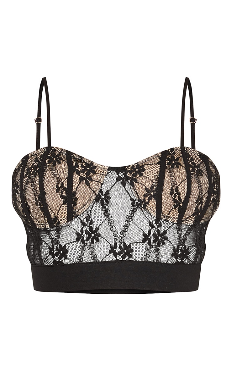 Crop top en dentelle transparente noire. | PrettyLittleThing FR