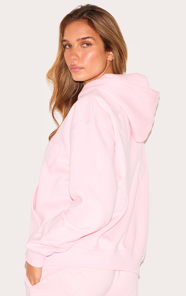 Baby Pink Embossed Heart Zip Up Hoodie | Sweat | PrettyLittleThing USA