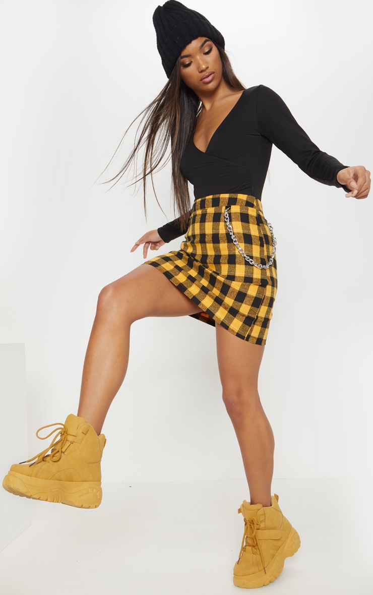 Body cache-coeur noir à manches longues. Tops | PrettyLittleThing FR