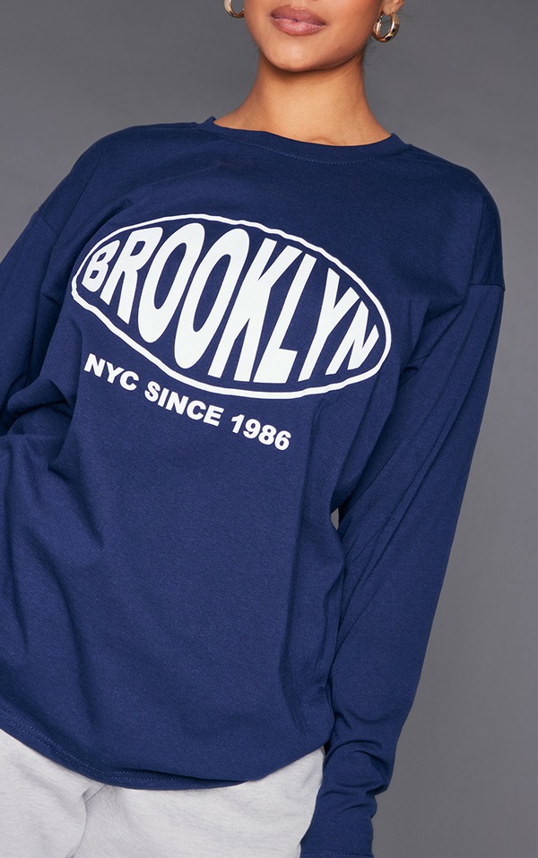 Navy Brooklyn Print Long Sleeve T Shirt | Tops | PrettyLittleThing USA