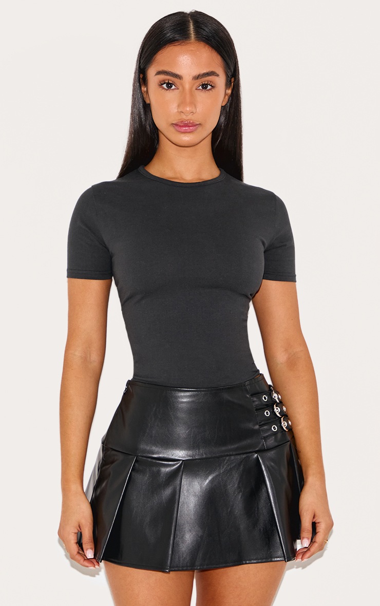 Petite Black Micro Mini PU Pleated Skirt | Petite | PrettyLittleThing IRE