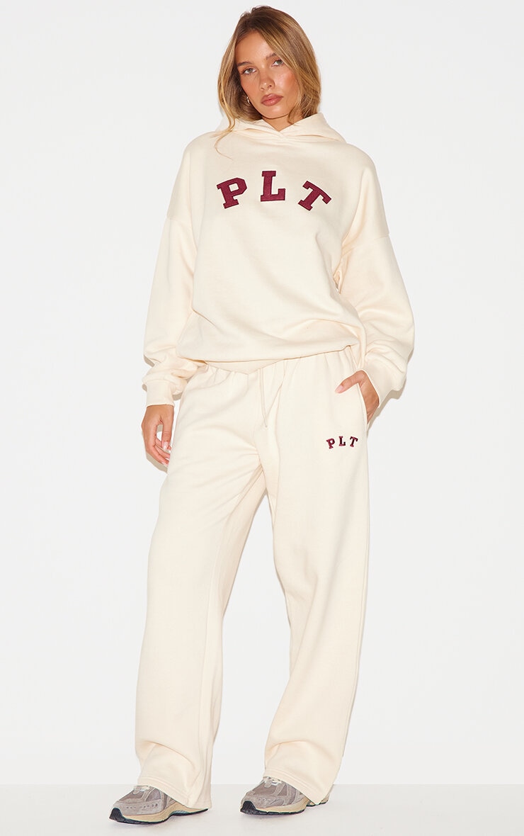 PLT Cream Logo Print Oversized Wide Leg Sweatpants | Sweat | PrettyLittleThing USA