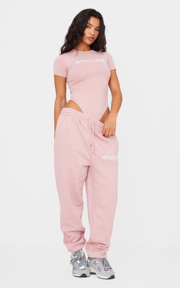 PLT Light Pink Logo Short Sleeve Bodysuit | Athleisure | PLT USA