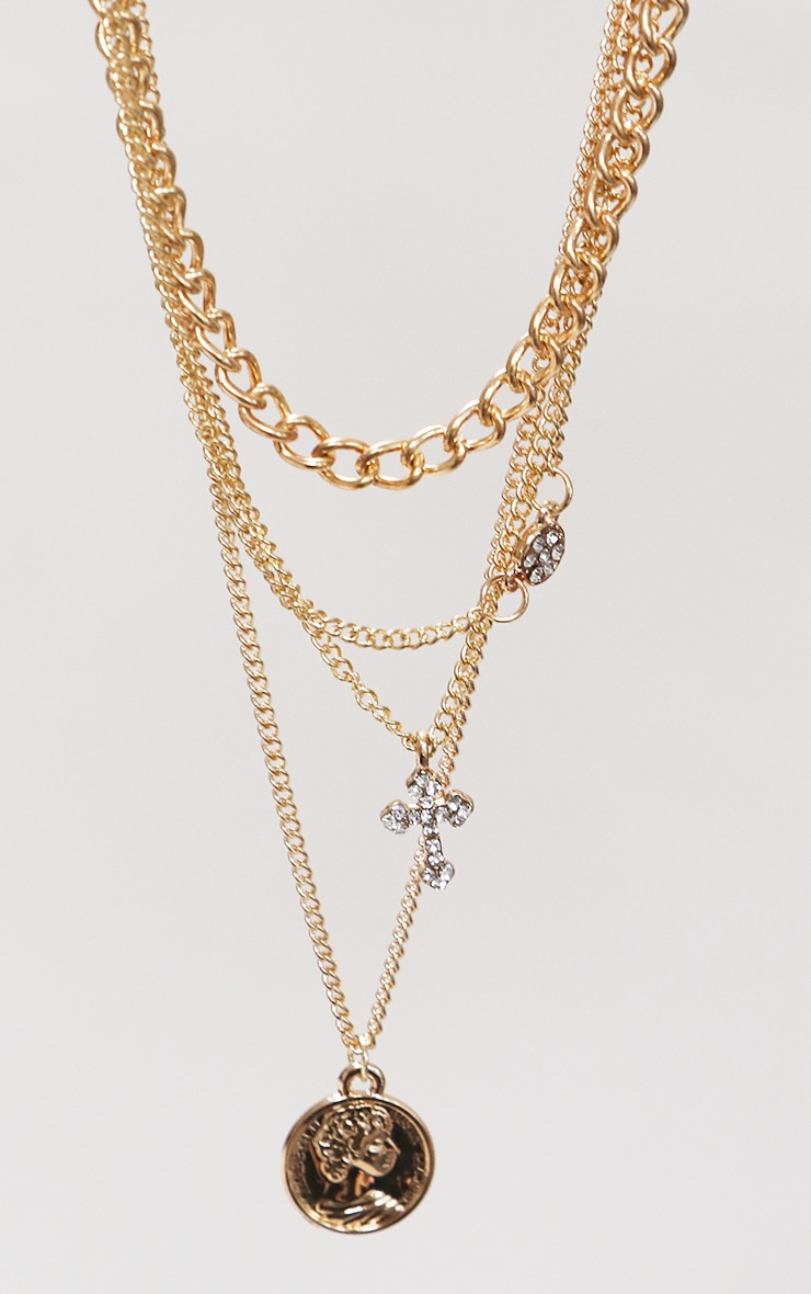 Collier doré de chaînes superposées multiples à pendentif croix ...