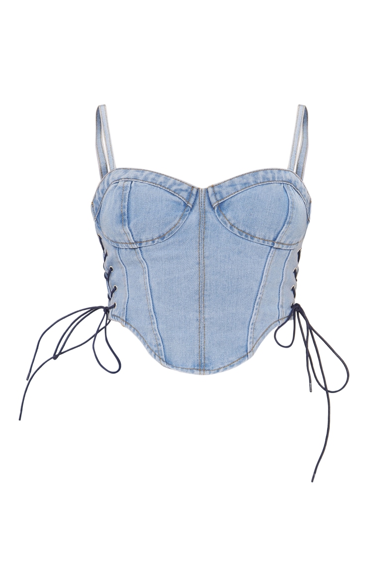Light Blue Wash Eyelet Dipped Denim Corset Top | PrettyLittleThing KSA