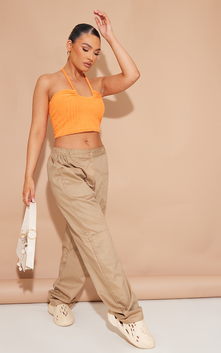 Orange Embossed Toweling Halter Crop Top | PrettyLittleThing