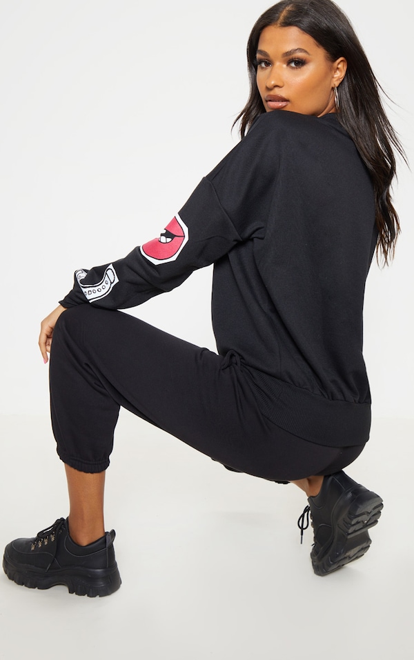 Abstract Face Printed Black Sweater | Tops | PrettyLittleThing USA