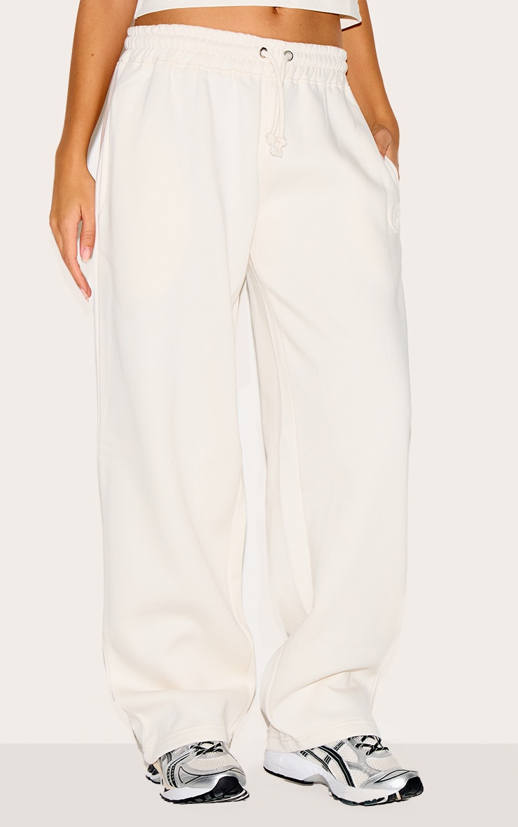 Cream Embossed Drawstring Joggers | Athleisure | PrettyLittleThing