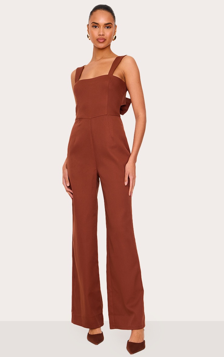 Chocolate Woven Cut Out Bow Detail Jumpsuit | Jumpsuits & Playsuits | PrettyLittleThing AUS
