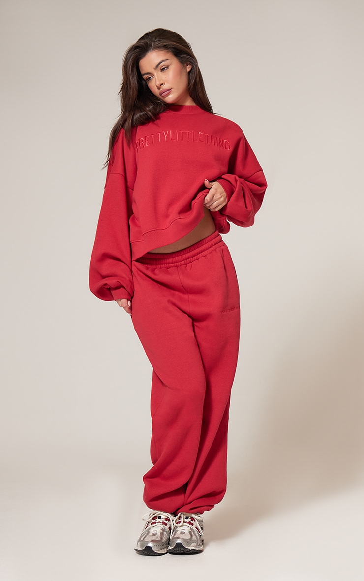 PLT Red Oversized Embroidered Cuffed Joggers | Athleisure | PLT