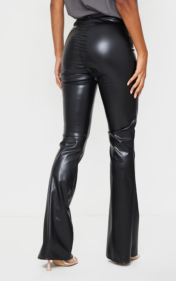 Black Flare Faux Leather Ruched Bum Pants | Bottoms | PrettyLittleThing USA