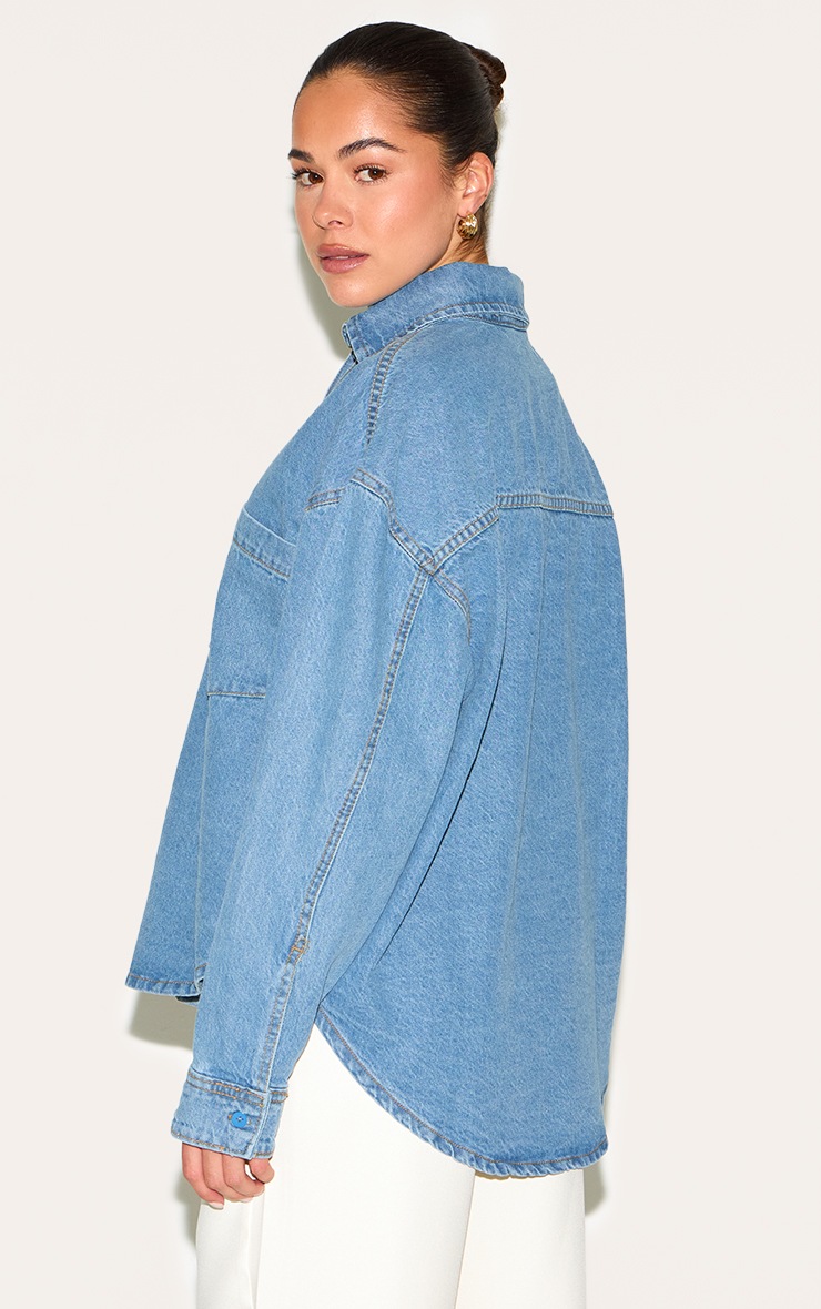 Mid Blue Wash Dip Hem Button Up Denim Shirt | Denim | PrettyLittleThing USA