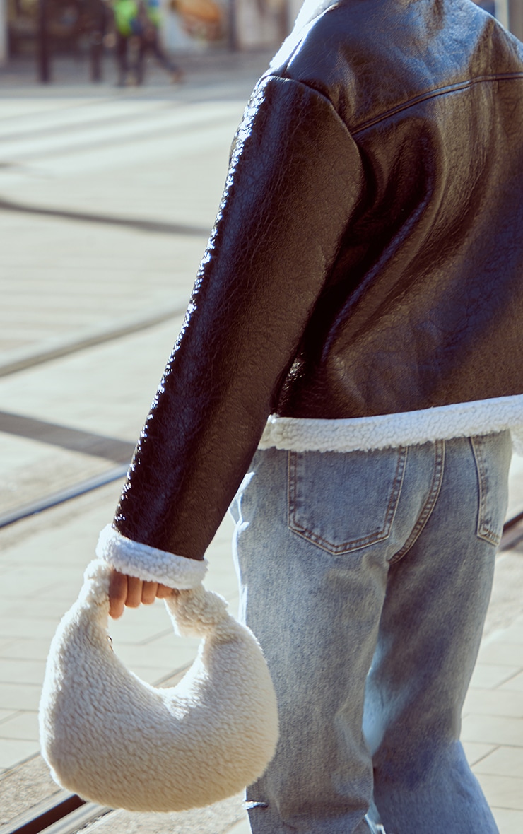 Beige Fluffy Knot Handle Curved Handbag | PrettyLittleThing