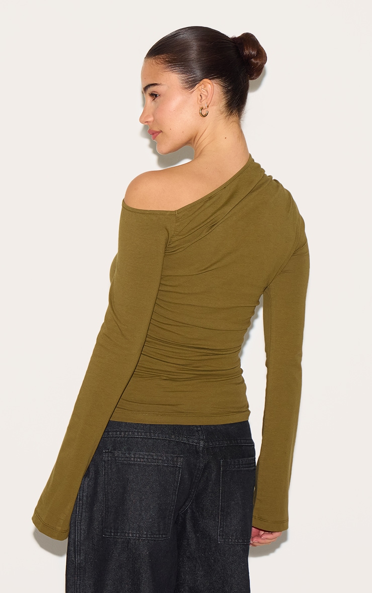 Olive Asymmetric Ruched Flared Sleeve Long Top | Tops | PrettyLittleThing