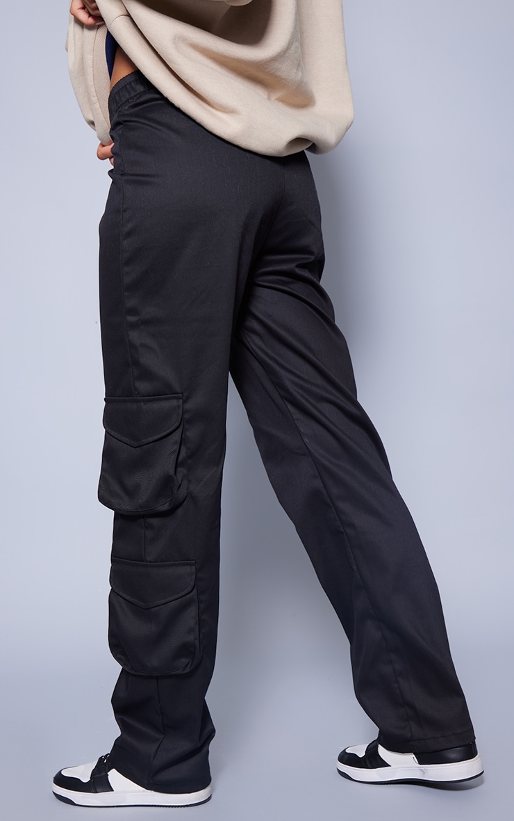 Black Low Rise V-Hem Cargos | Bottoms | PrettyLittleThing