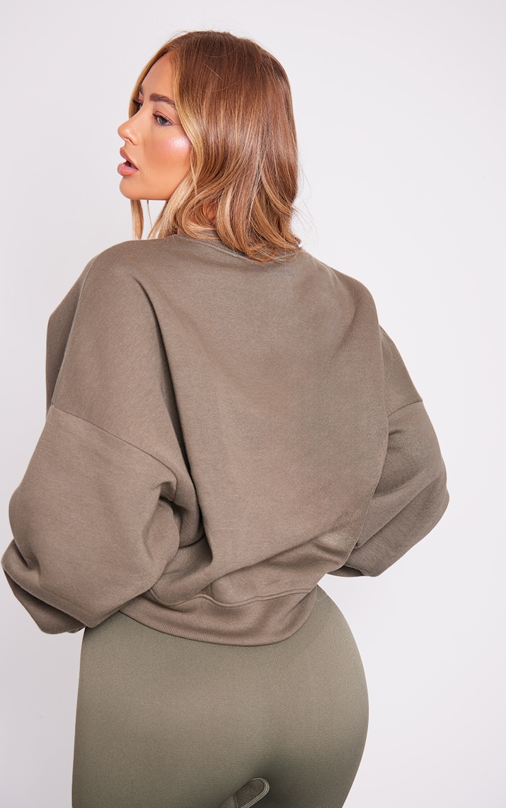 PLT Olive Sport Oversized Boxy Sweatshirt | Activewear | PrettyLittleThing USA