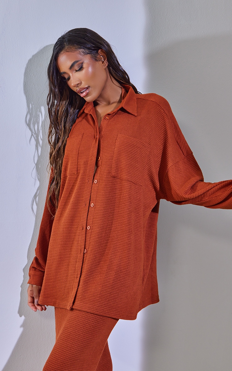 Rust Textured Beach Shirt | Swimwear | PrettyLittleThing USA
