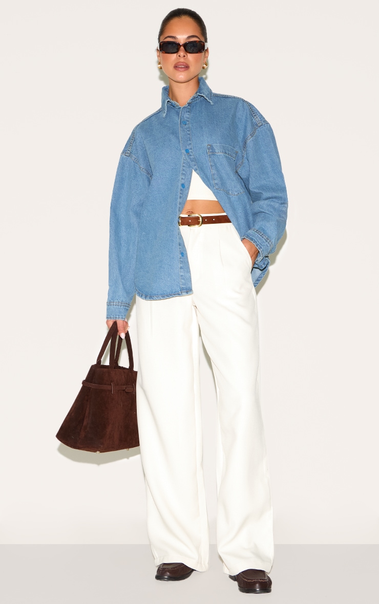 Mid Blue Wash Dip Hem Button Up Denim Shirt | Denim | PrettyLittleThing CA