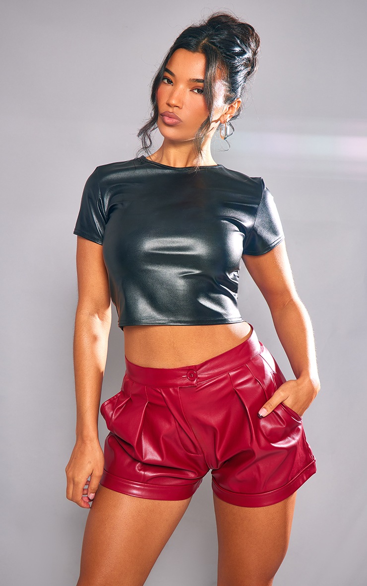 Oxblood Faux Leather Pleat Detail Shorts | PrettyLittleThing
