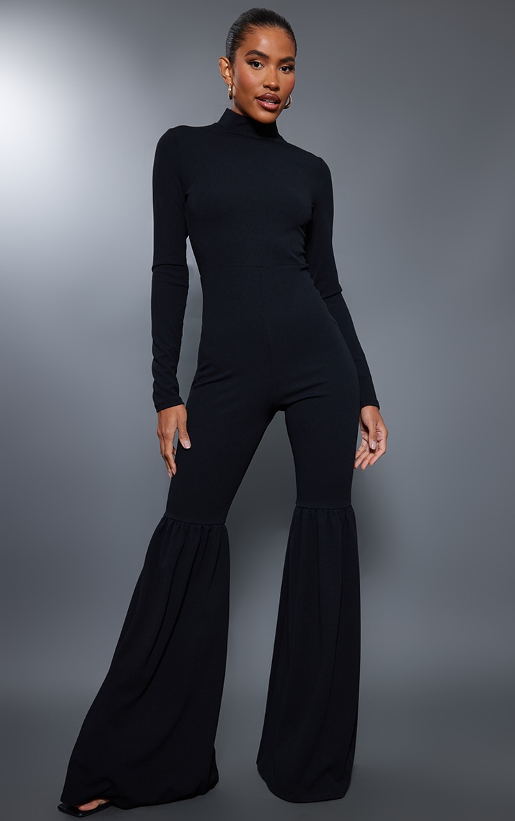 Black High Neck Extreme Flare Long Sleeve Jumpsuit | Dresses | PLT USA