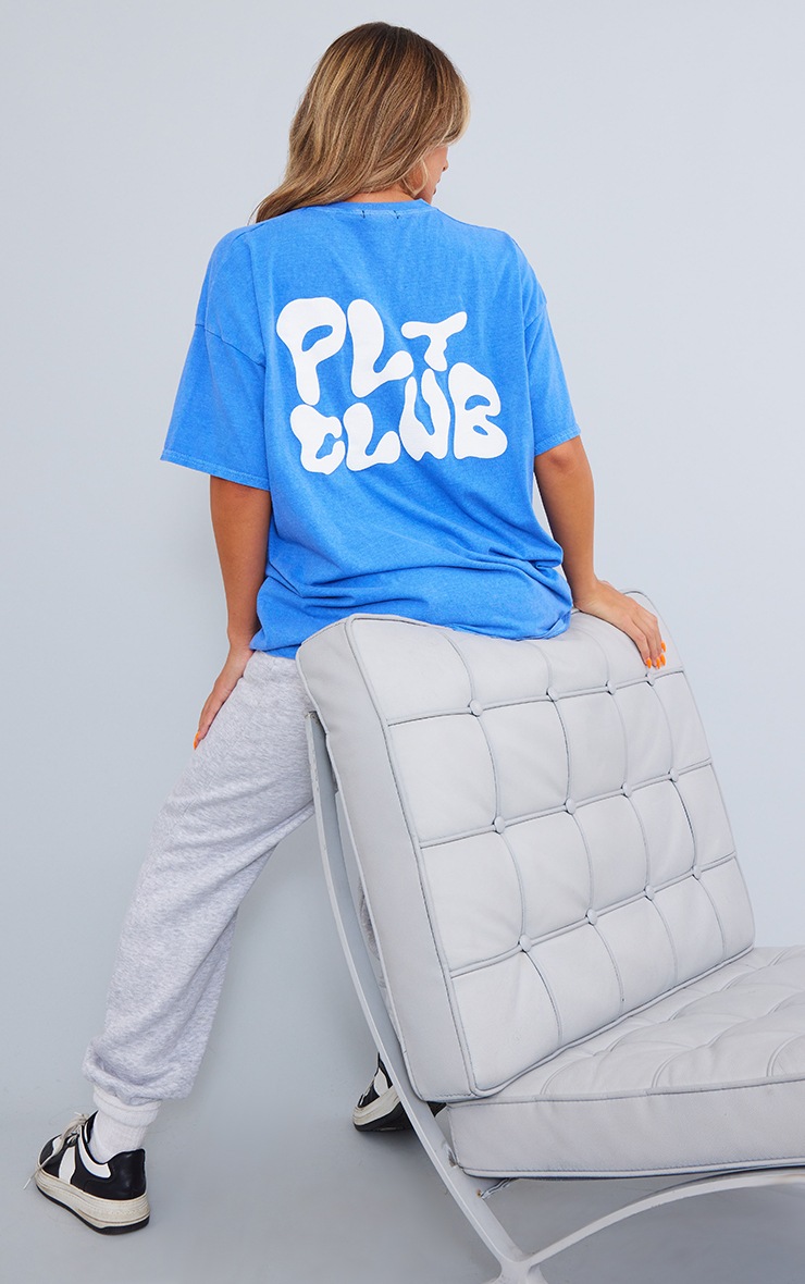 PLT Dark Blue Club Puff Print T Shirt | Tops | PrettyLittleThing USA