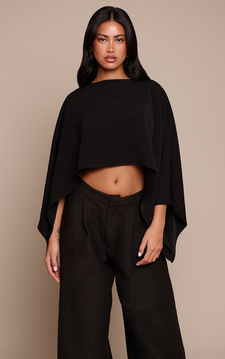 Black Woven Cape Style Top | Tops | PrettyLittleThing USA