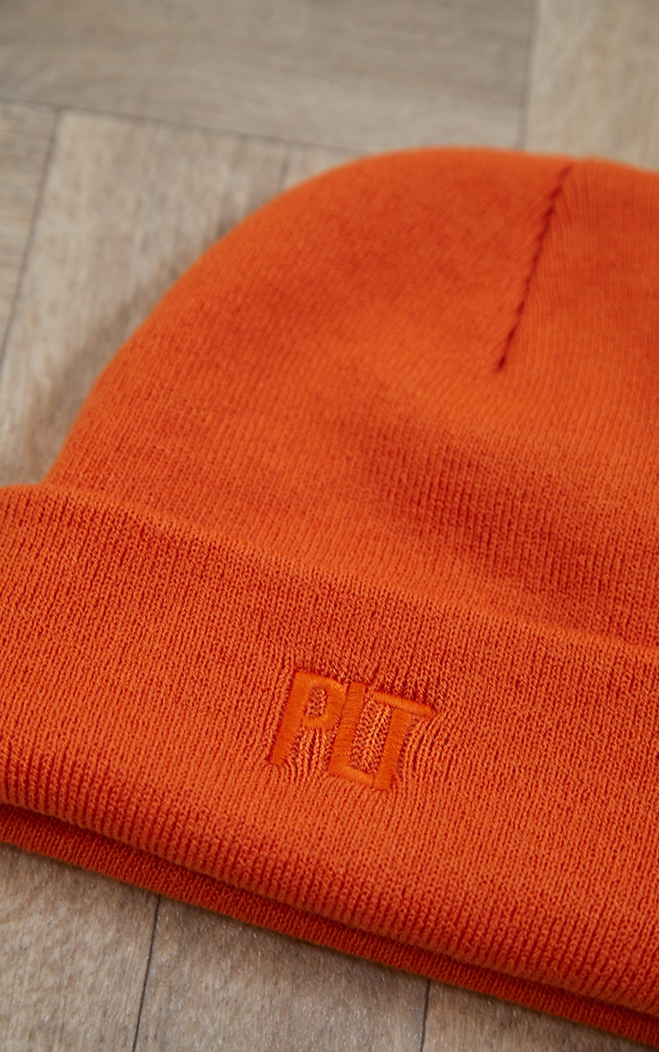 PRETTYLITTLETHING Bonnet orange à logo | PrettyLittleThing FR