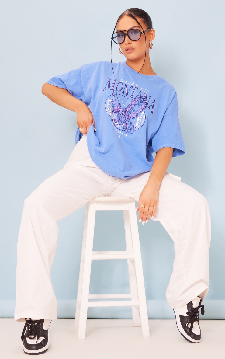 Washed Blue Montana Logo Oversized Washed T Shirt | Tops | PLT USA