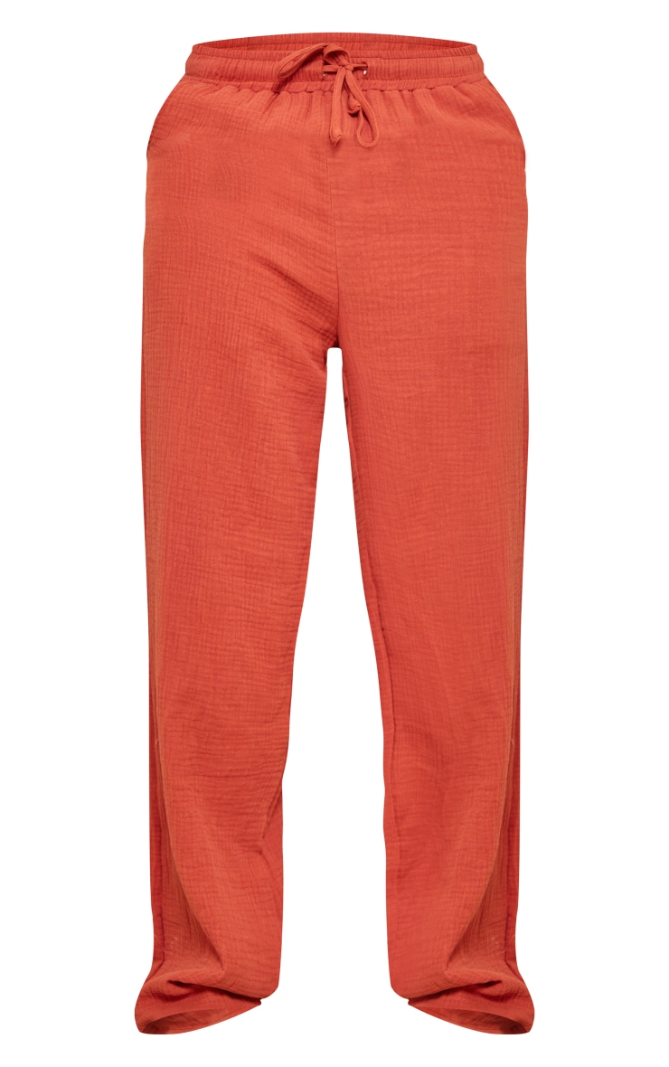 Rust Textured Cheesecloth Drawstring Waist Trousers | PrettyLittleThing