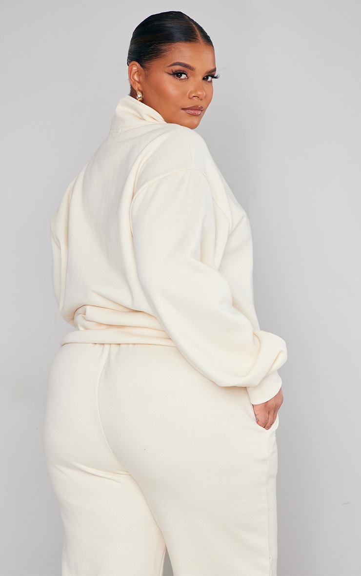 Plus Cream Zip Up Sweater | Plus Size | PrettyLittleThing USA