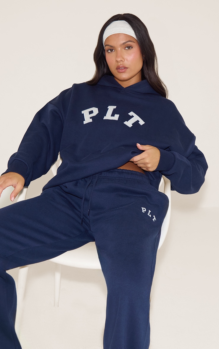 PRETTYLITTLETHING Navy Logo Oversized Hoodie | Athleisure | PLT USA