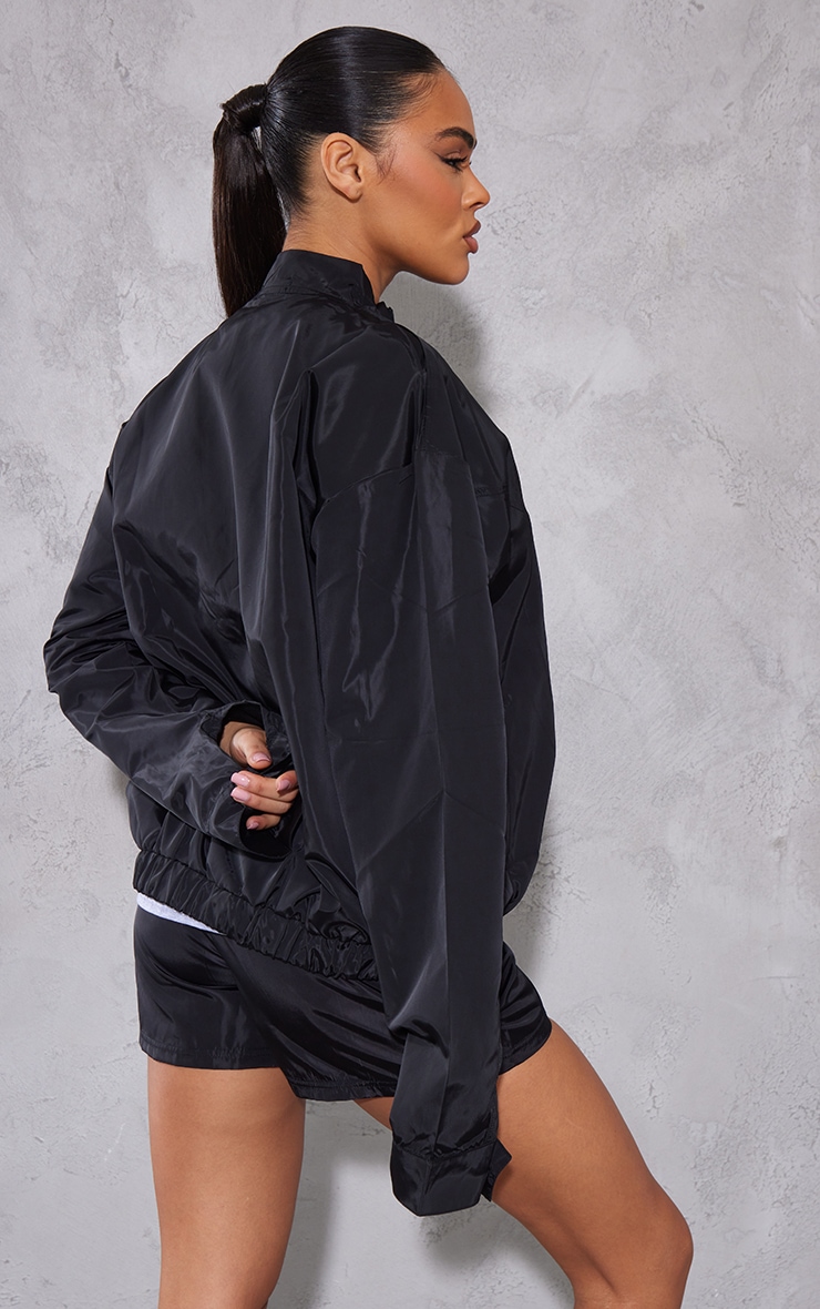 Prettylittlething Black Sport Shell Zip Up Jacket | PrettyLittleThing