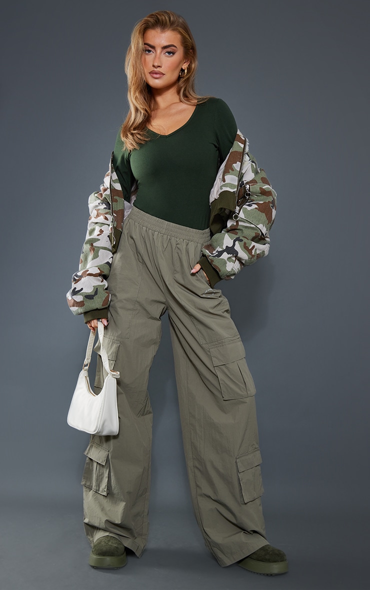 Pine Green Cotton V Neck Long Sleeve Bodysuit | Tops | PLT