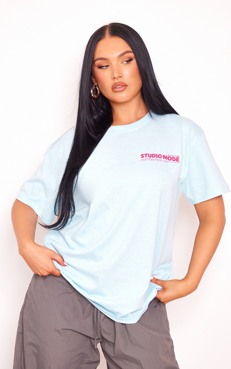 Blue Studio Mode Printed T Shirt | Tops | PrettyLittleThing