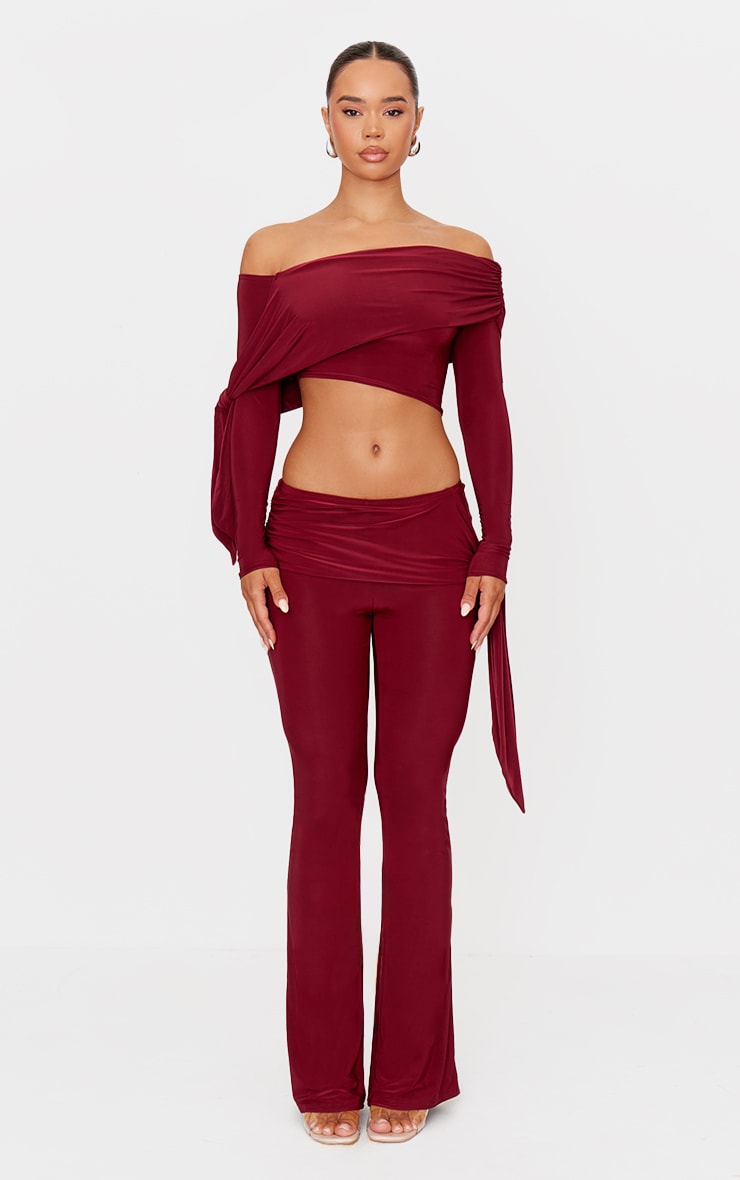 Red flared pants | PrettyLittleThing USA