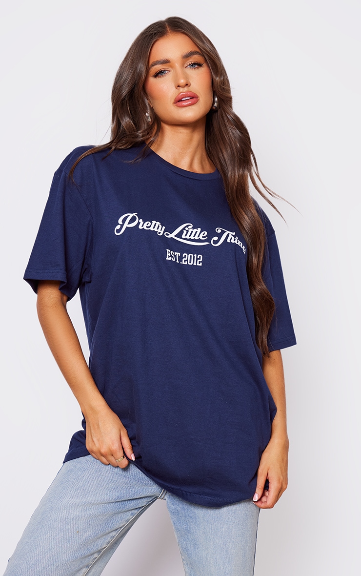 PRETTYLITTLETHING Navy 2012 Print T Shirt | Tops | PrettyLittleThing CA