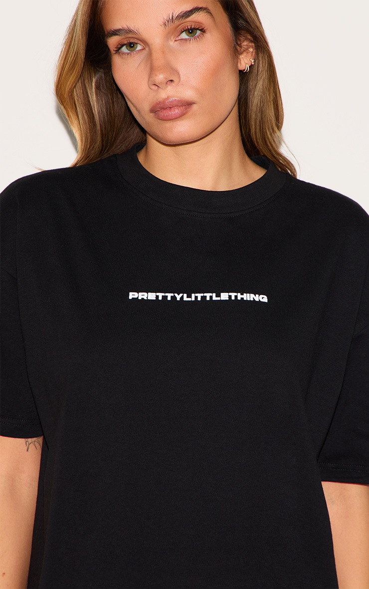 PRETTYLITTLETHING Black Print Oversize T Shirt | Co-ords | PrettyLittleThing