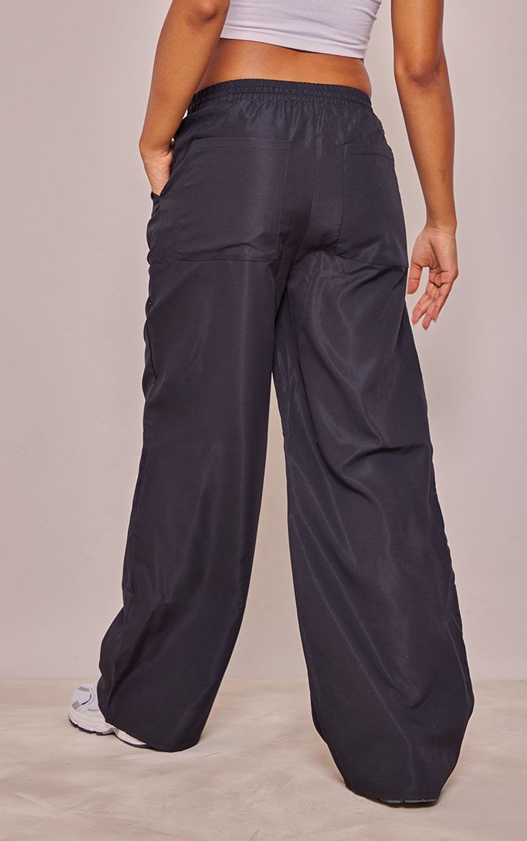 Black Tailored Drawstring Waist Wide Leg Trousers | PrettyLittleThing