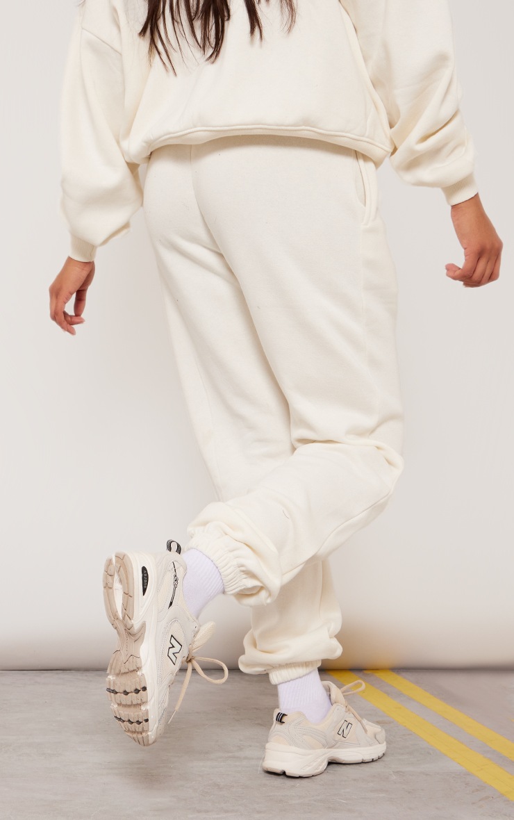 PLT Tall Cream Embroidered Cuff Sweatpants | Tall | PrettyLittleThing USA