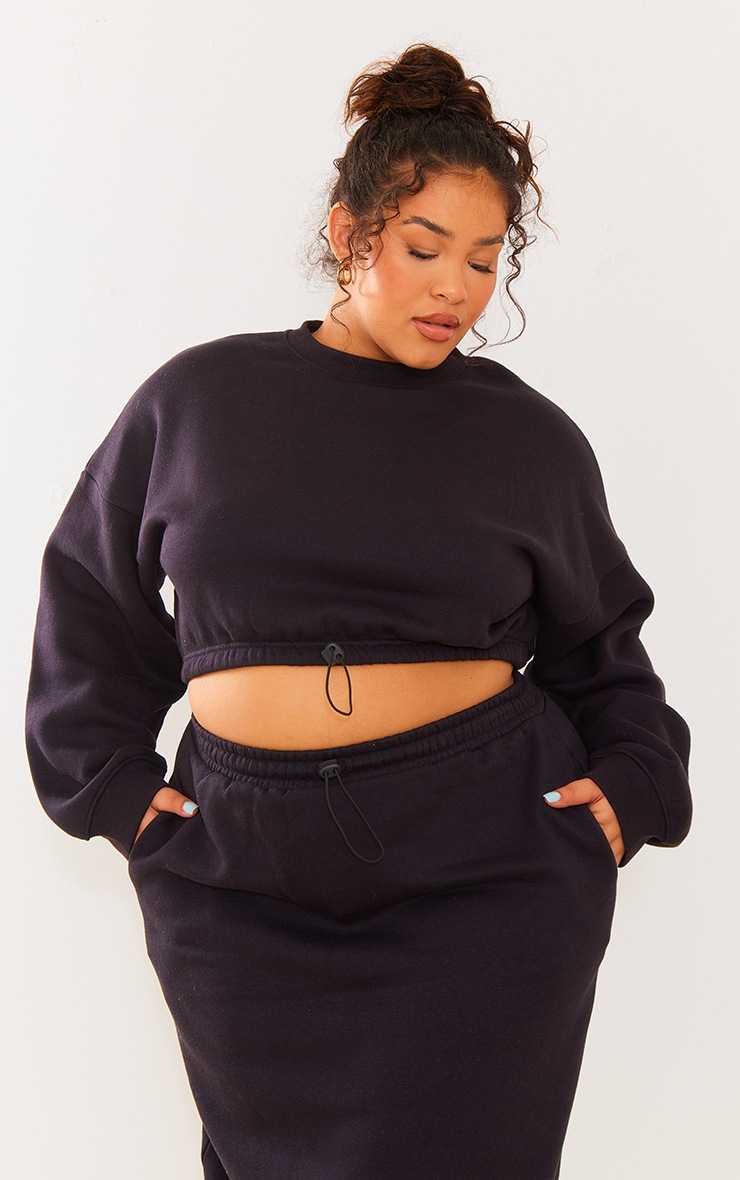 Plus Black Toggle Hem Crop Sweatshirt | PrettyLittleThing KSA