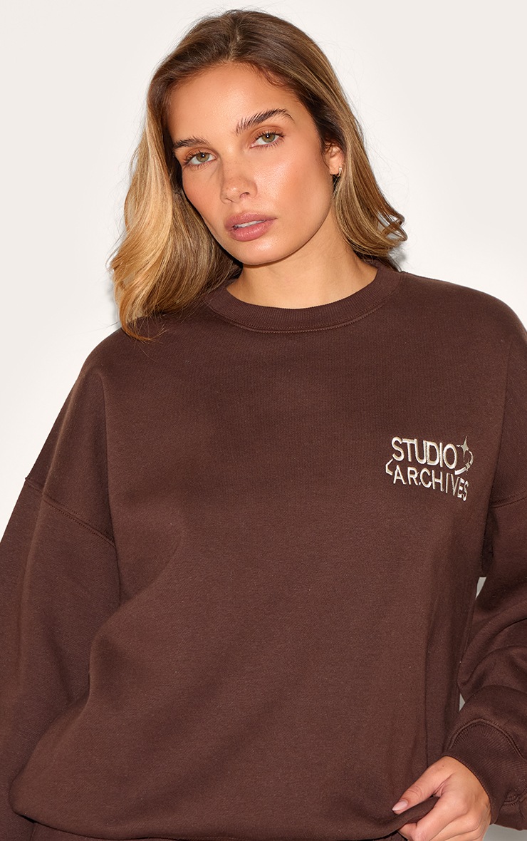 Chocolate Studio Archives Embroidered Sweatshirt | Athleisure | PrettyLittleThing USA