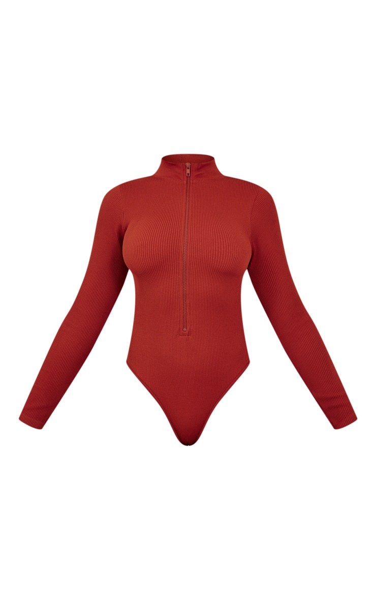 Rust Snatched Rib Zip Up Long Sleeve Bodysuit | PrettyLittleThing QA