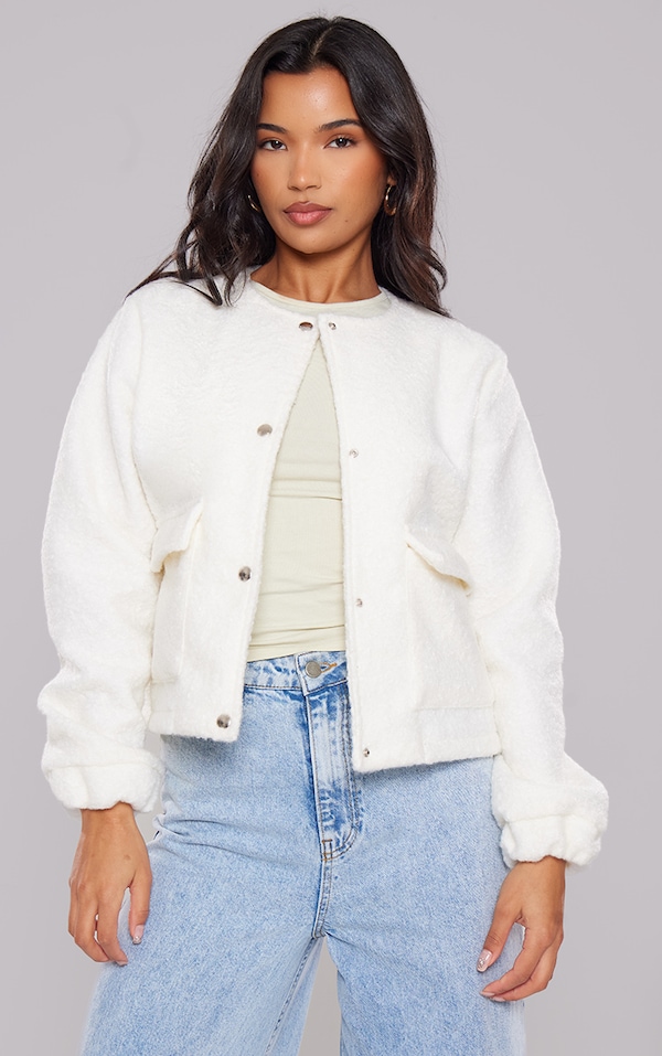 Cream Borg Oversized Bomber Jacket | Outerwear | PrettyLittleThing USA