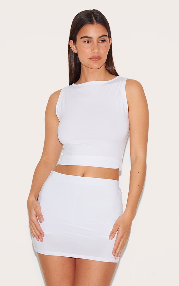 White Slinky Basic Low Rise Mini Skort | Bottoms | PrettyLittleThing CA