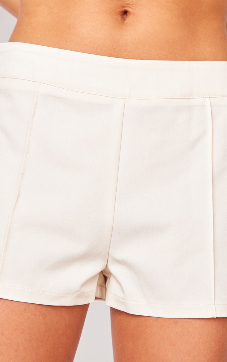 Cream Tailored Woven Hot Pants | Bottoms | PrettyLittleThing
