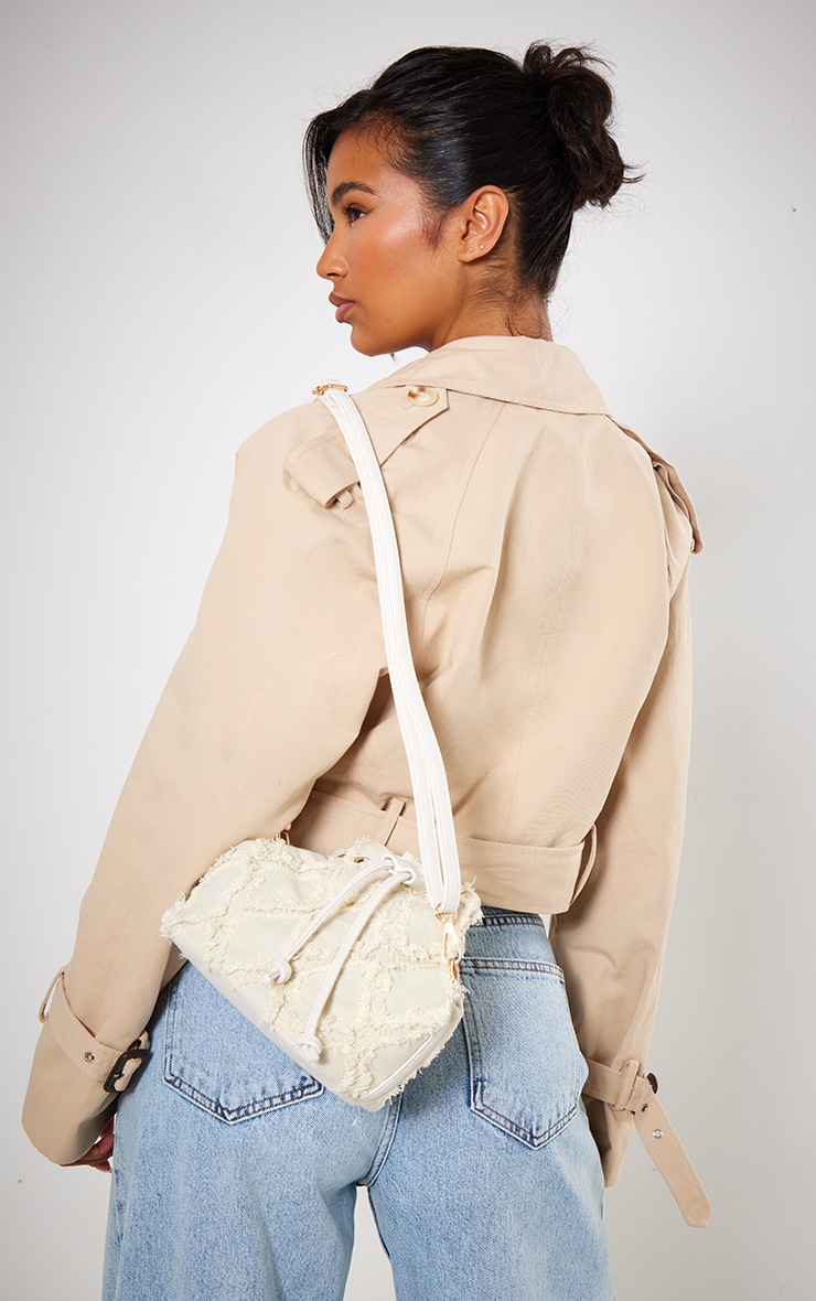 Cream Frayed Denim Drawstring Cross Body | Accessories | PLT