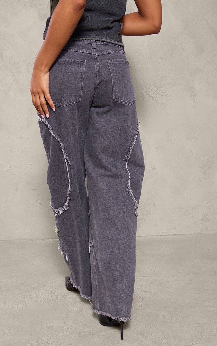 Dark Grey Asymmetric Frayed Mid Rise Jeans | PrettyLittleThing USA