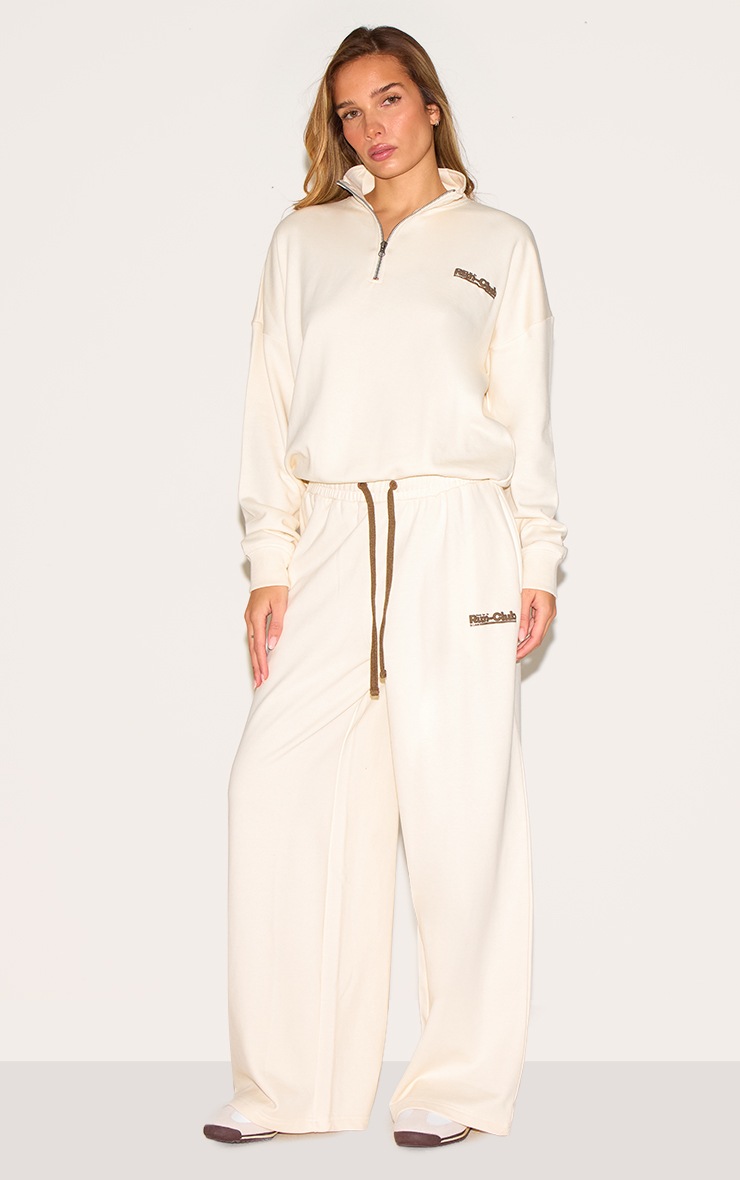 Cream Run Club Puff Print Quarter Zip Sweatshirt | Athleisure | PrettyLittleThing USA