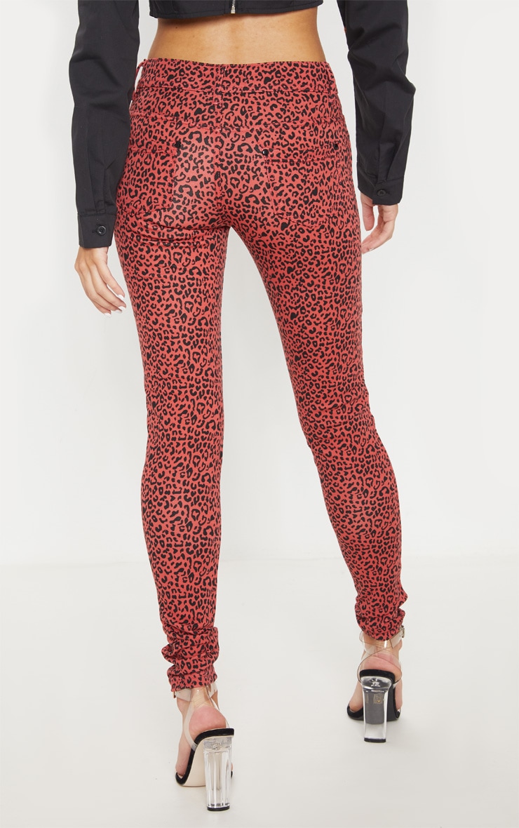 Red Leopard Jegging | Trousers | PrettyLittleThing