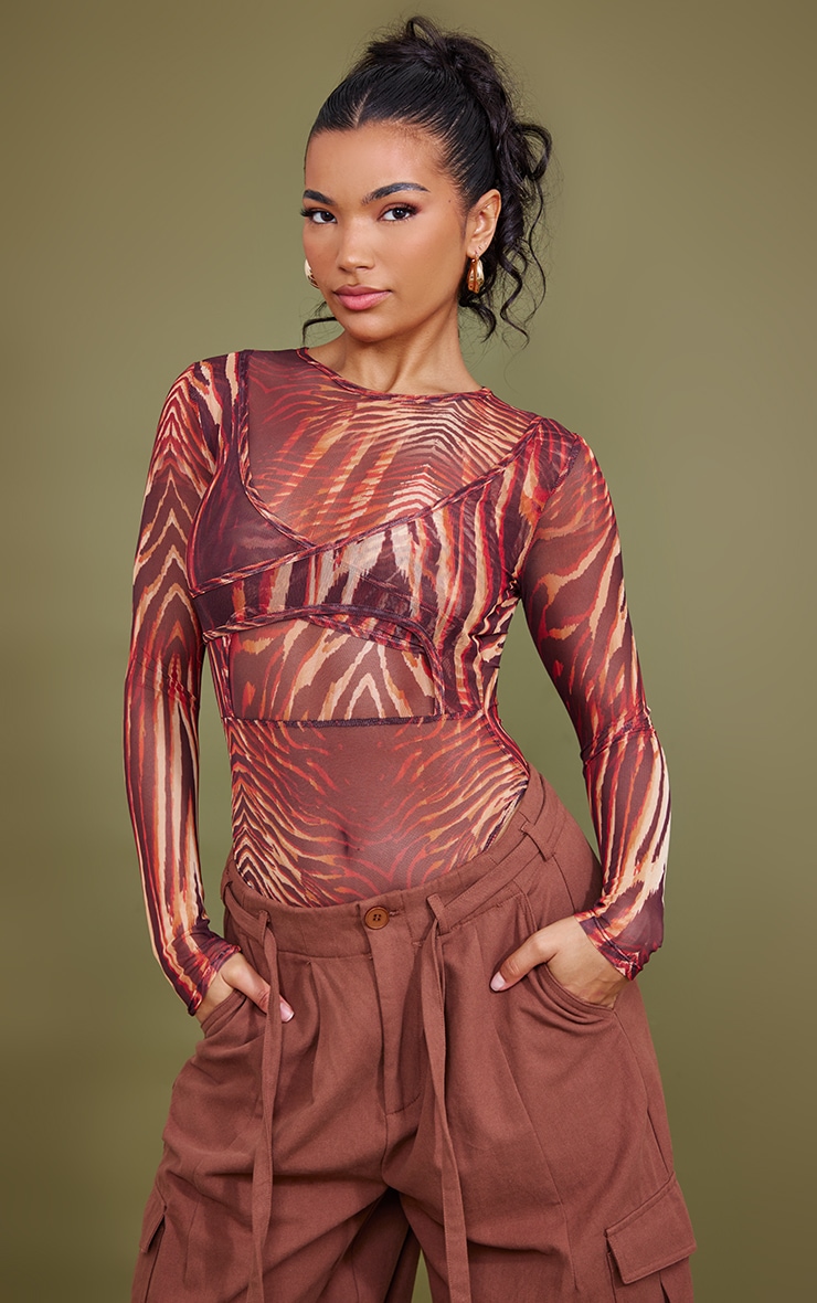 Burnt Orange Printed Mesh Long Sleeve Bodysuit | PrettyLittleThing KSA